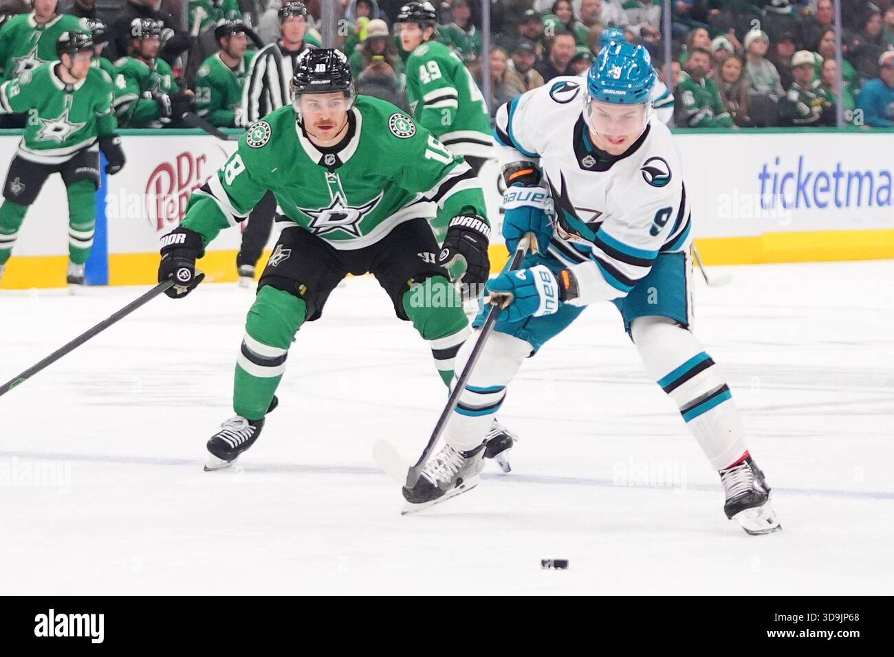 San Jose Sharks defenseman Dmitry Orlov (9) skates for the puck in ...