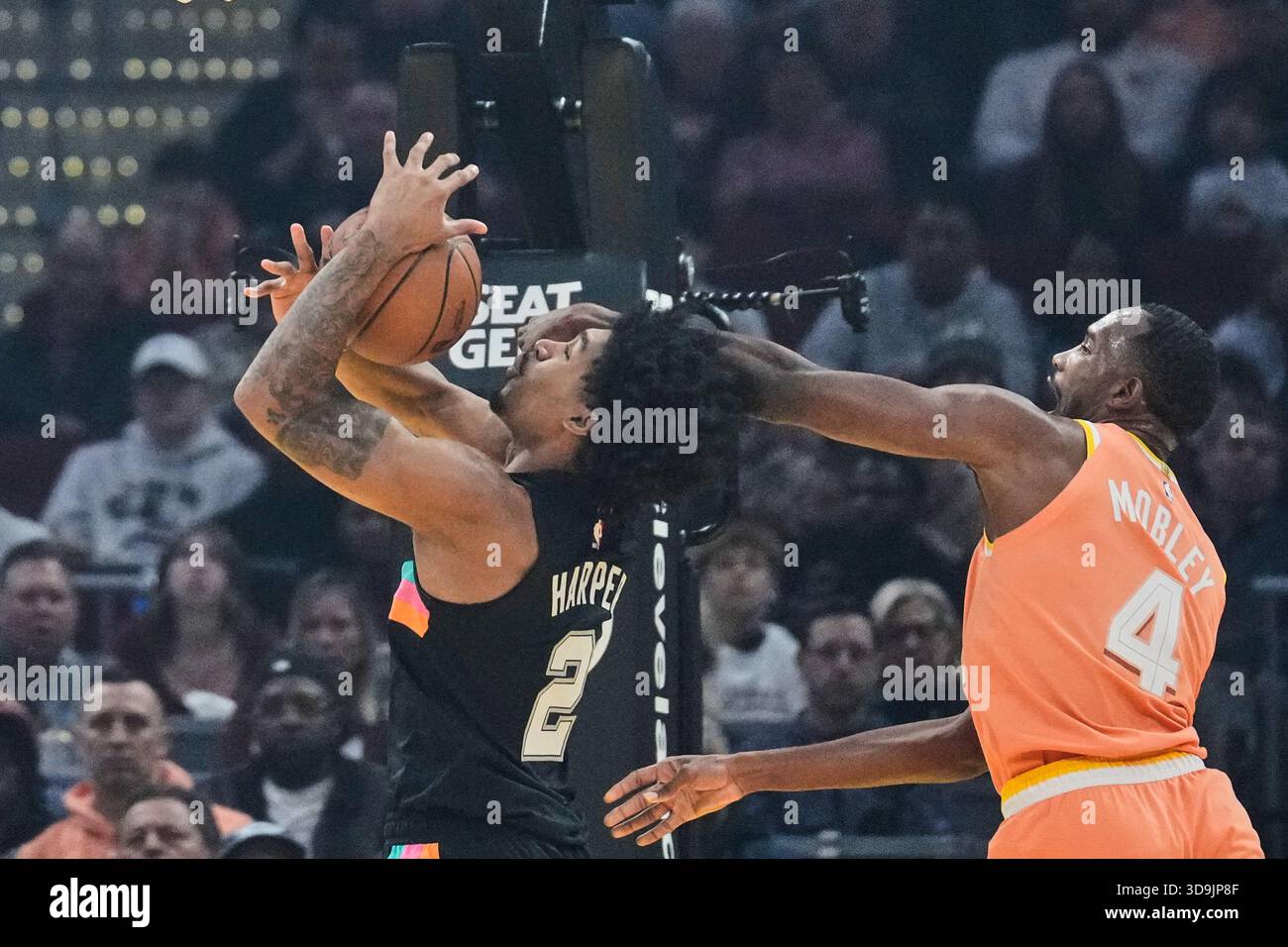 Cleveland Cavaliers center Evan Mobley (4) knocks the ball away from ...