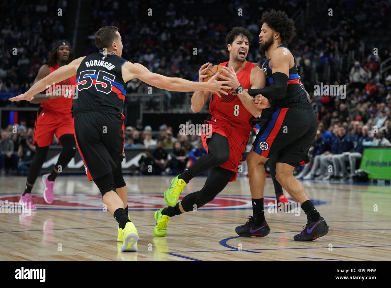 Portland Trail Blazers forward Deni Avdija, center, drives against ...