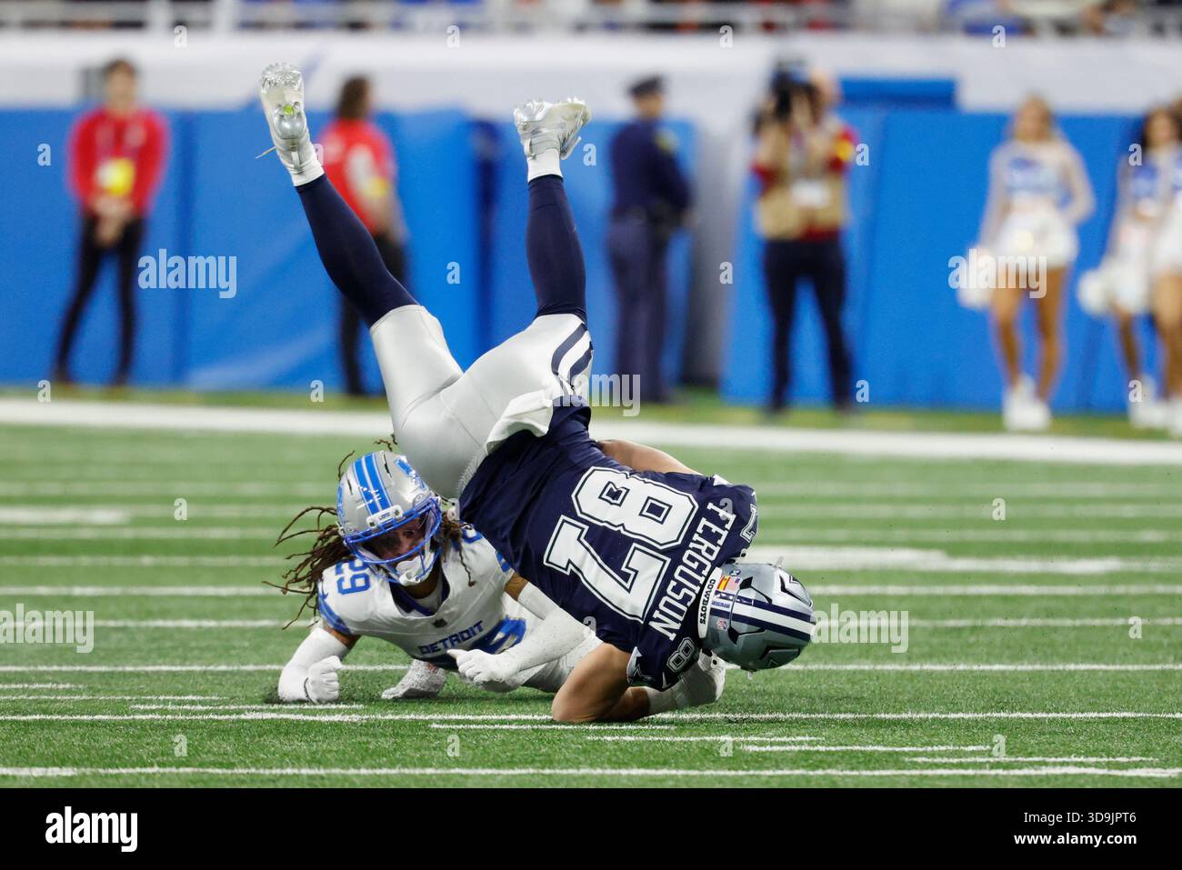 Dallas Cowboys tight end Jake Ferguson (87) is tackled by Detroit Lions ...