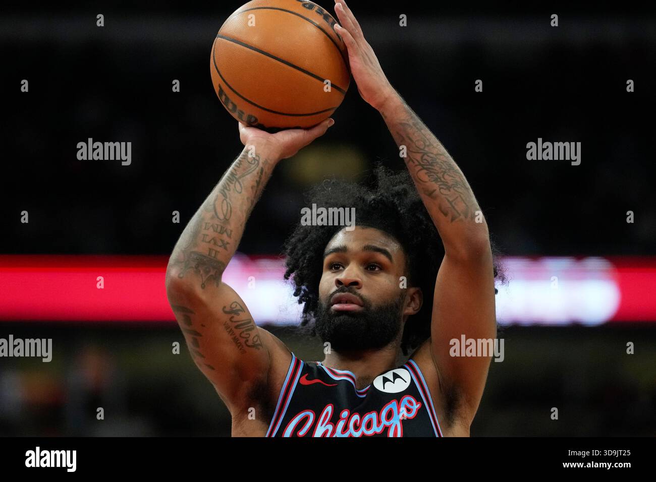 Chicago Bulls guard Coby White (0) takes a free throw during the first ...