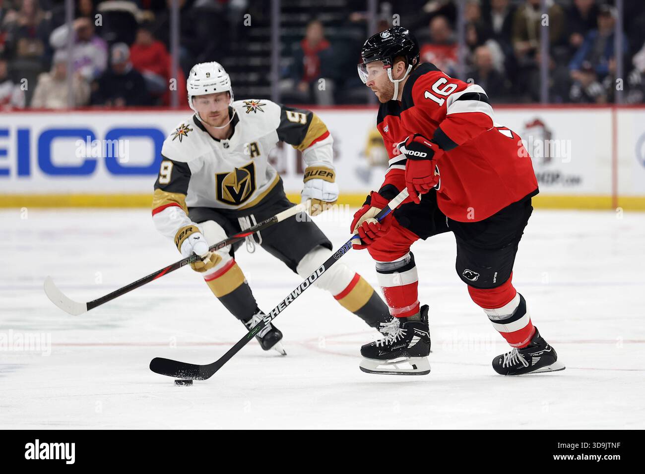 New Jersey Devils right wing Connor Brown (16) controls the puck in ...