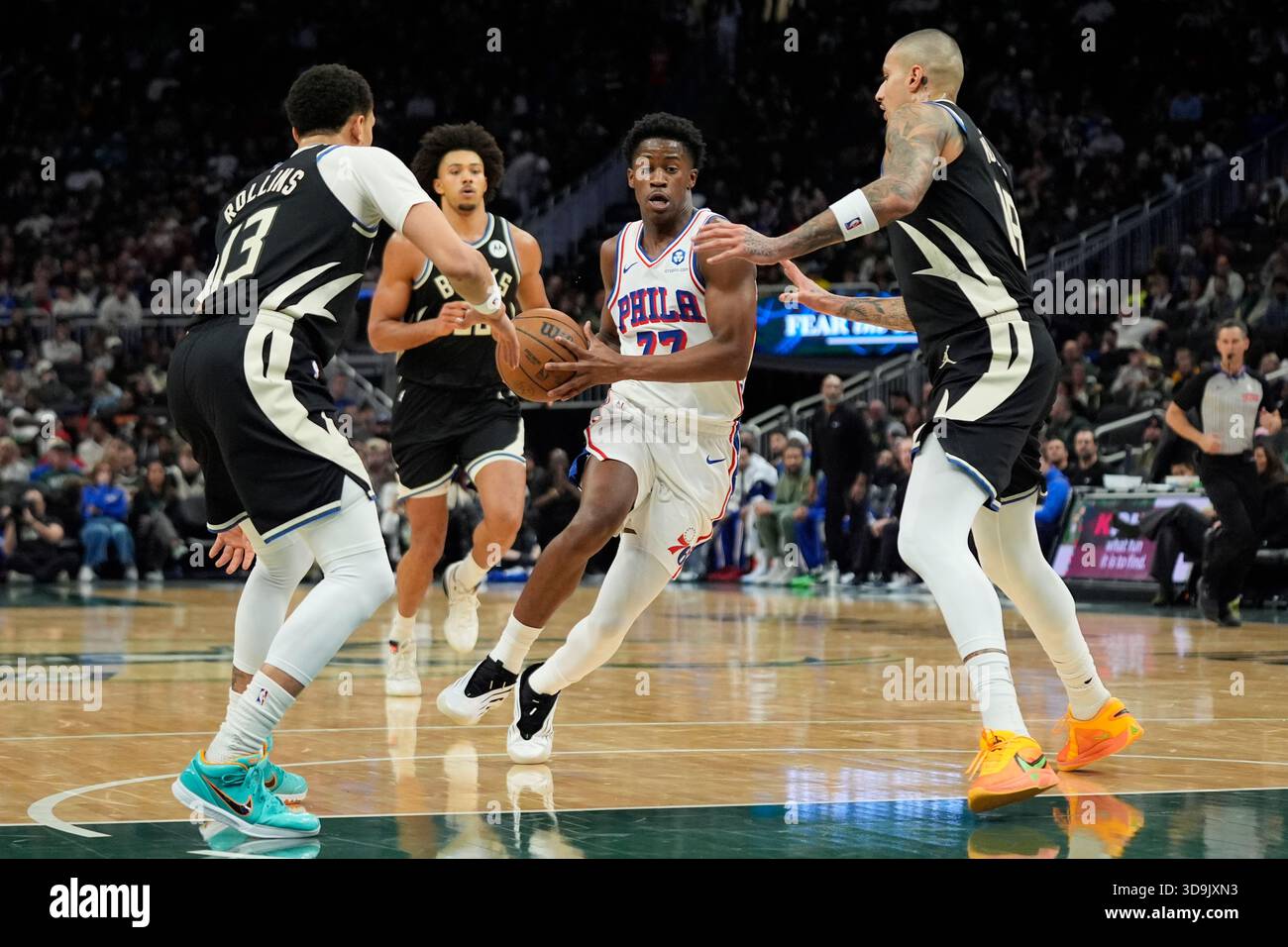 Philadelphia 76ers' VJ Edgecombe (77) drives to the basket between ...