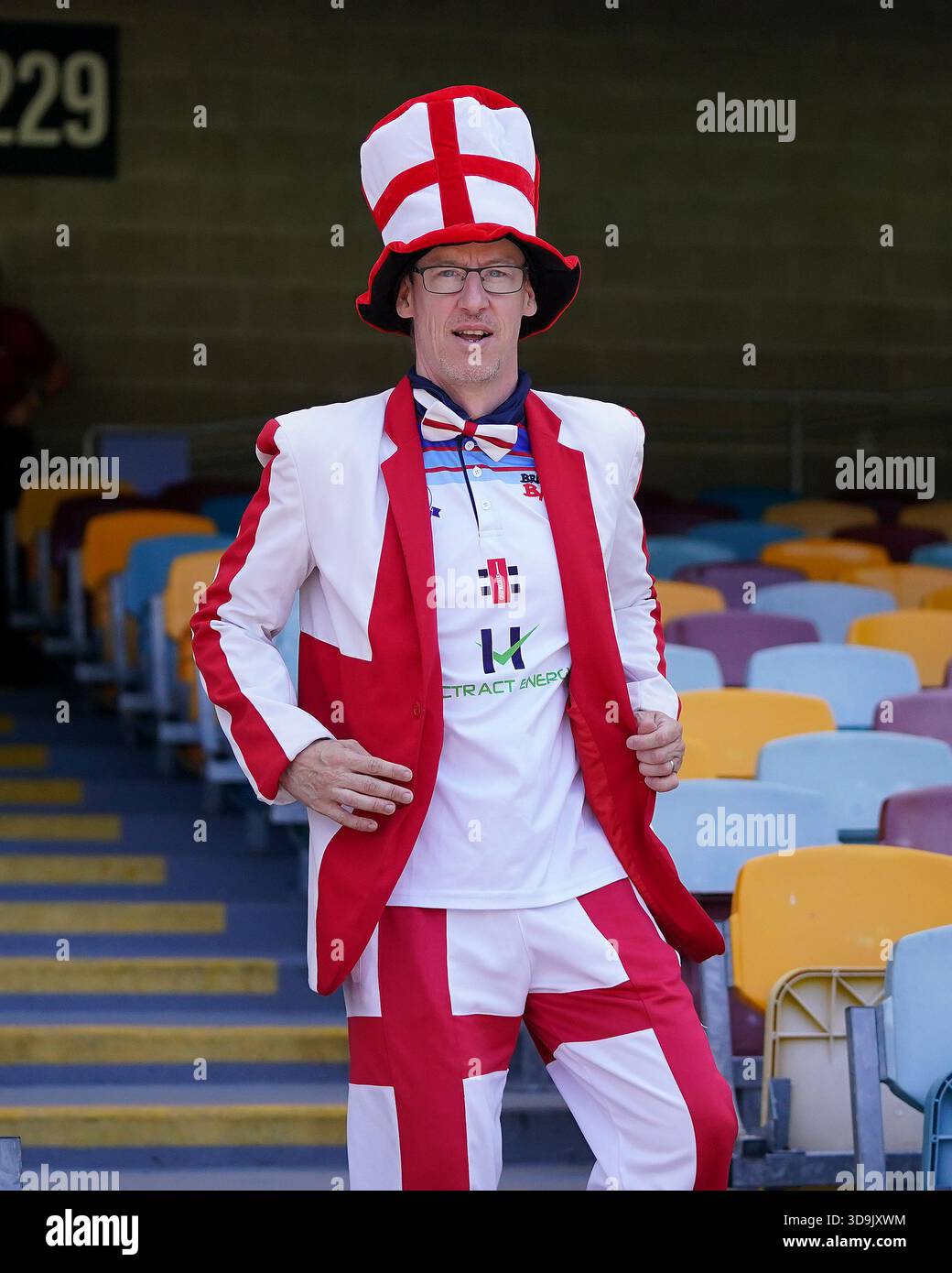 An England fan dressed in St George's cross clothing arrives at the ...