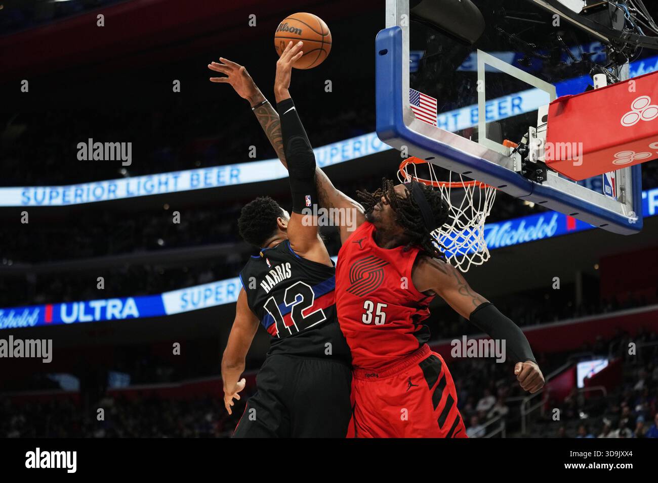 Detroit Pistons forward Tobias Harris, left, attempts to dunk against ...