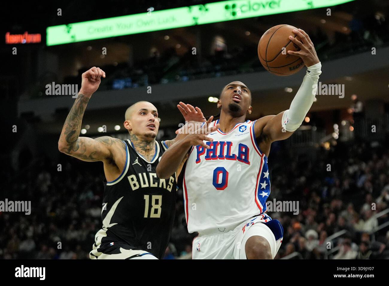 Philadelphia 76ers' Tyrese Maxey (0) drives to the basket against ...