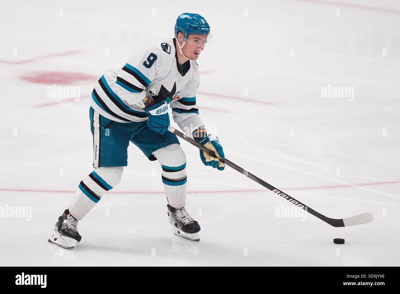 San Jose Sharks defenseman Dmitry Orlov (9) controls the puck during ...