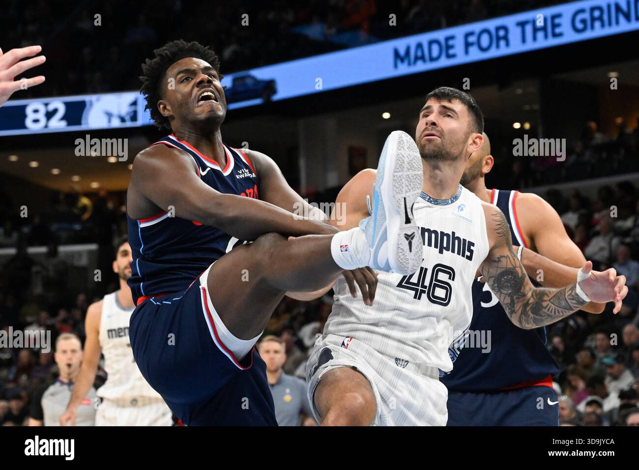 Los Angeles Clippers forward Kobe Brown, left, rebounds against Memphis ...