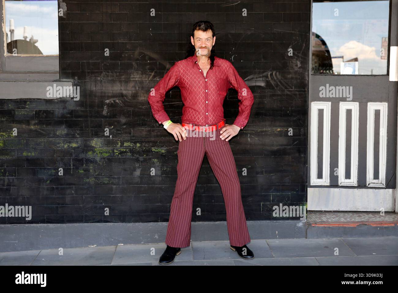 Joe Falbo of Melbourne in his disco getup during the Mulletfest grand ...