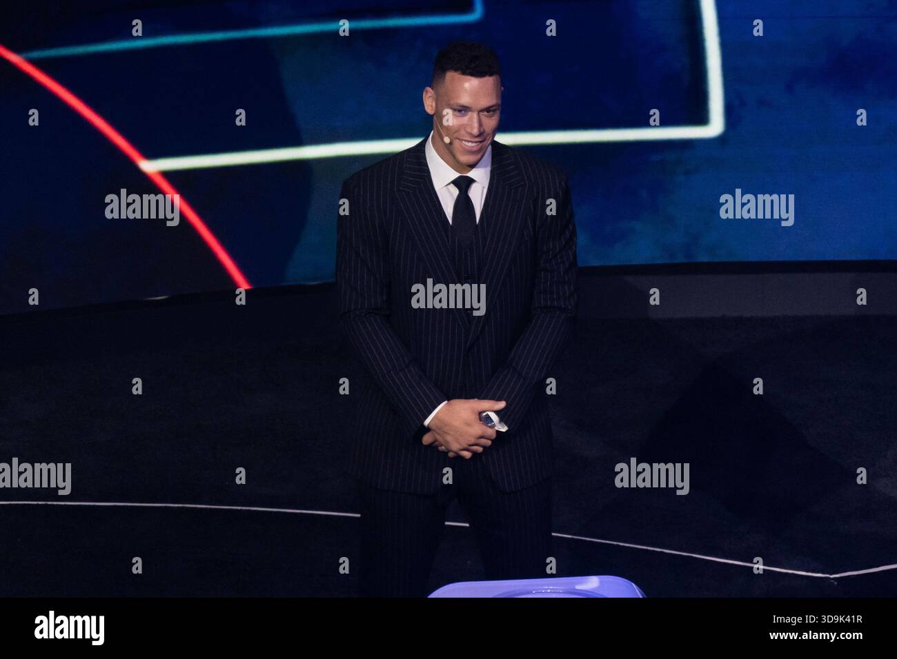 Aaron Judge assists during the 2026 FIFA World Cup draw at the John F ...