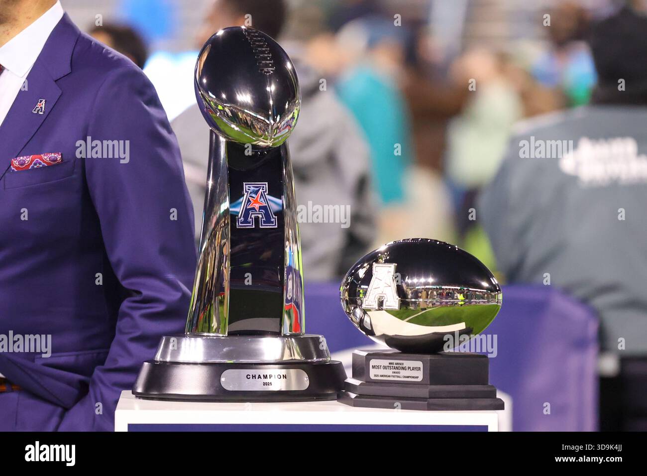 The American Conference football championship and game MVP trophies are ...