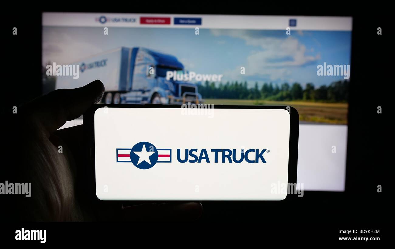 In this photo illustration, a cellphone with the logo of US logistics ...
