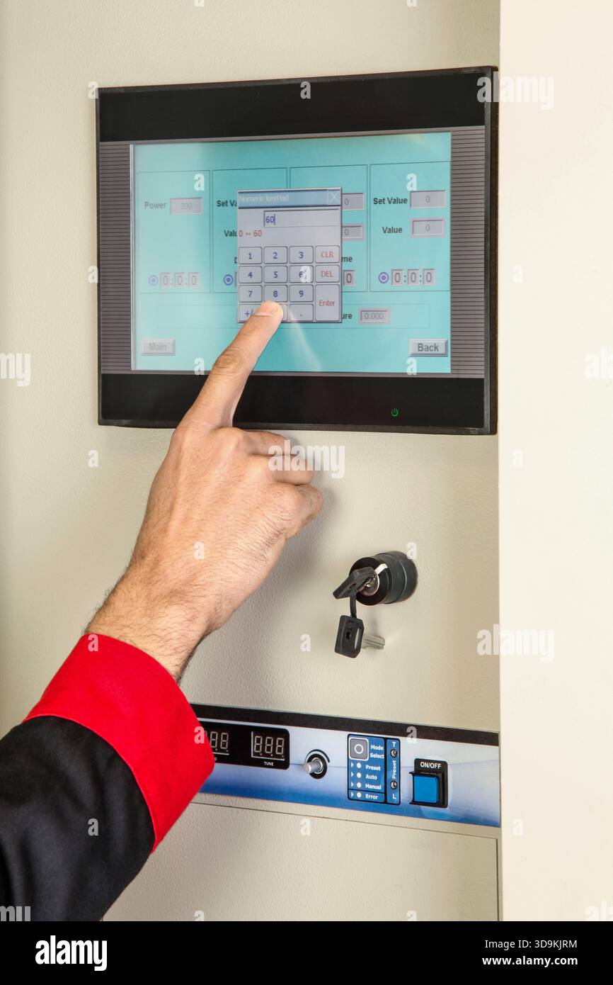 Hand presses key on machine hi-res stock photography and images - Alamy