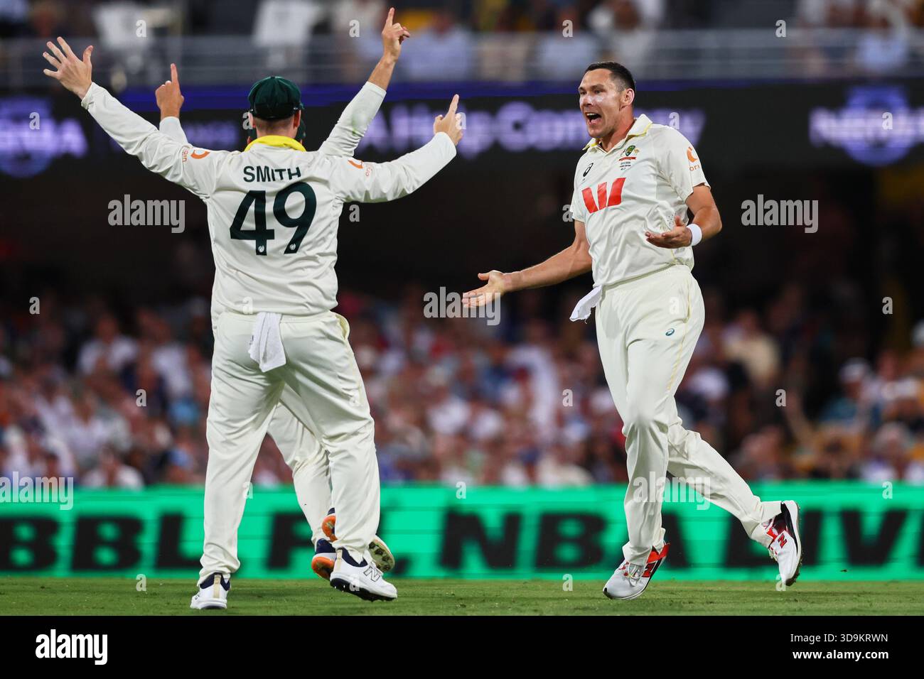 Australia's Scott Boland celebrates with teammates the wicket of ...