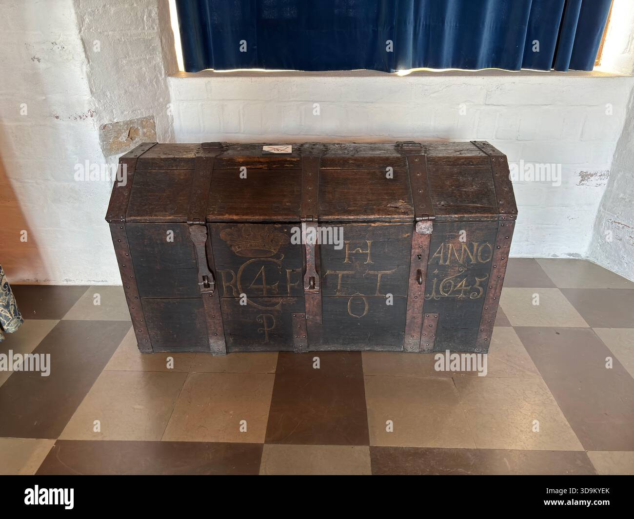 Medieval oak chests feature carved feet iron bands locks and wood grain ...