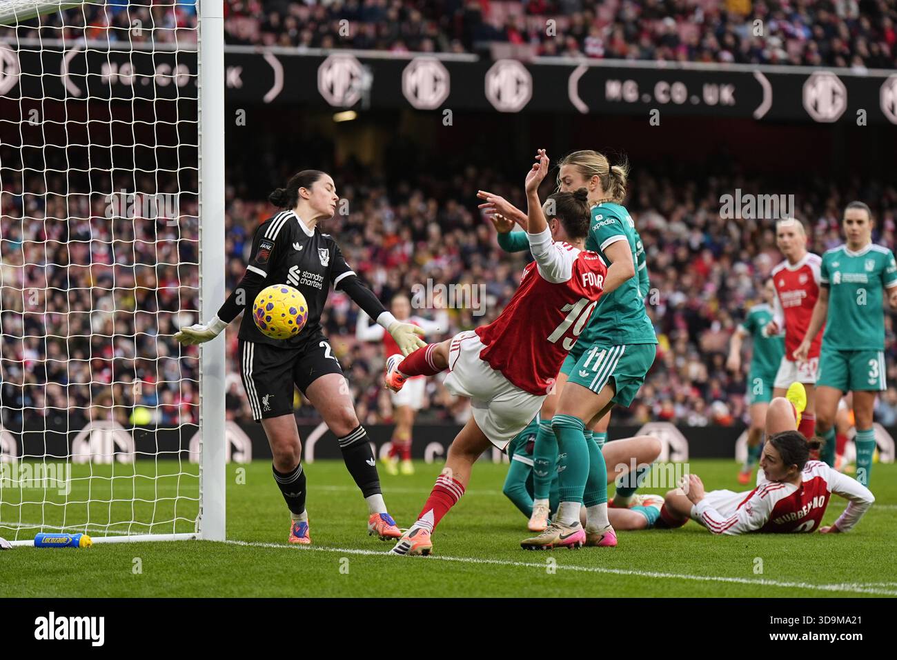 Liverpool goalkeeper Faye Kirby saves a shot from Arsenal's Caitlin ...