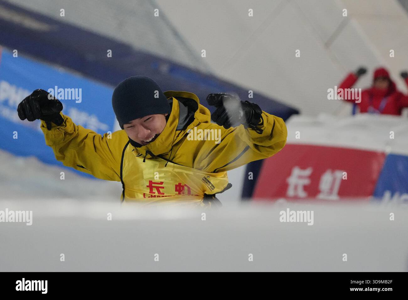 Su Yiming of China celebrates after winning in the men's snowboard big ...
