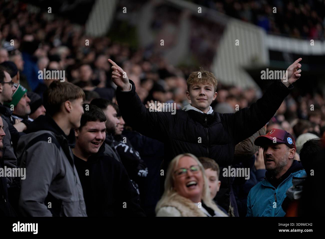 Derby fans celebrate their team scoring a goal to make it 1-3 during ...