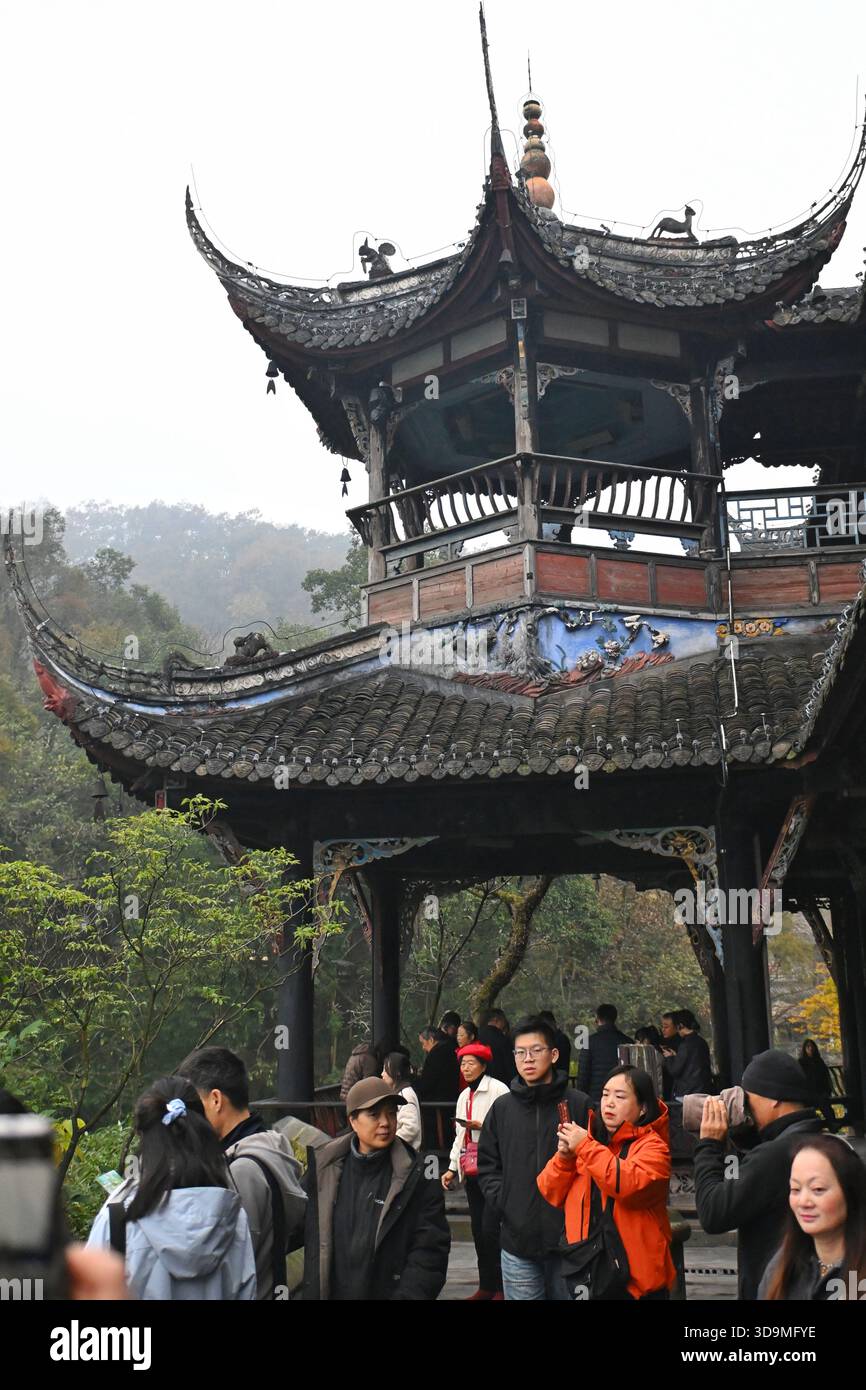 (251206) -- CHENGDU, Dec. 6, 2025 (Xinhua) -- Tourists visit Huaigu ...