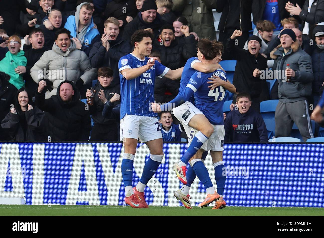 Yousef Salech of Cardiff city (l) celebrates with teammates after he ...