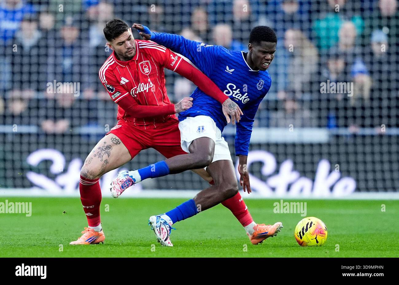 Nottingham Forest's Morato and Everton's Thierno Barry (right) battle ...
