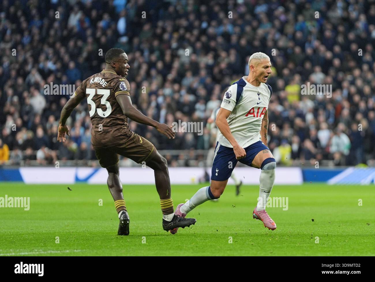 Brentford's Michael Kayode fouls Tottenham Hotspur's Richarlison during ...