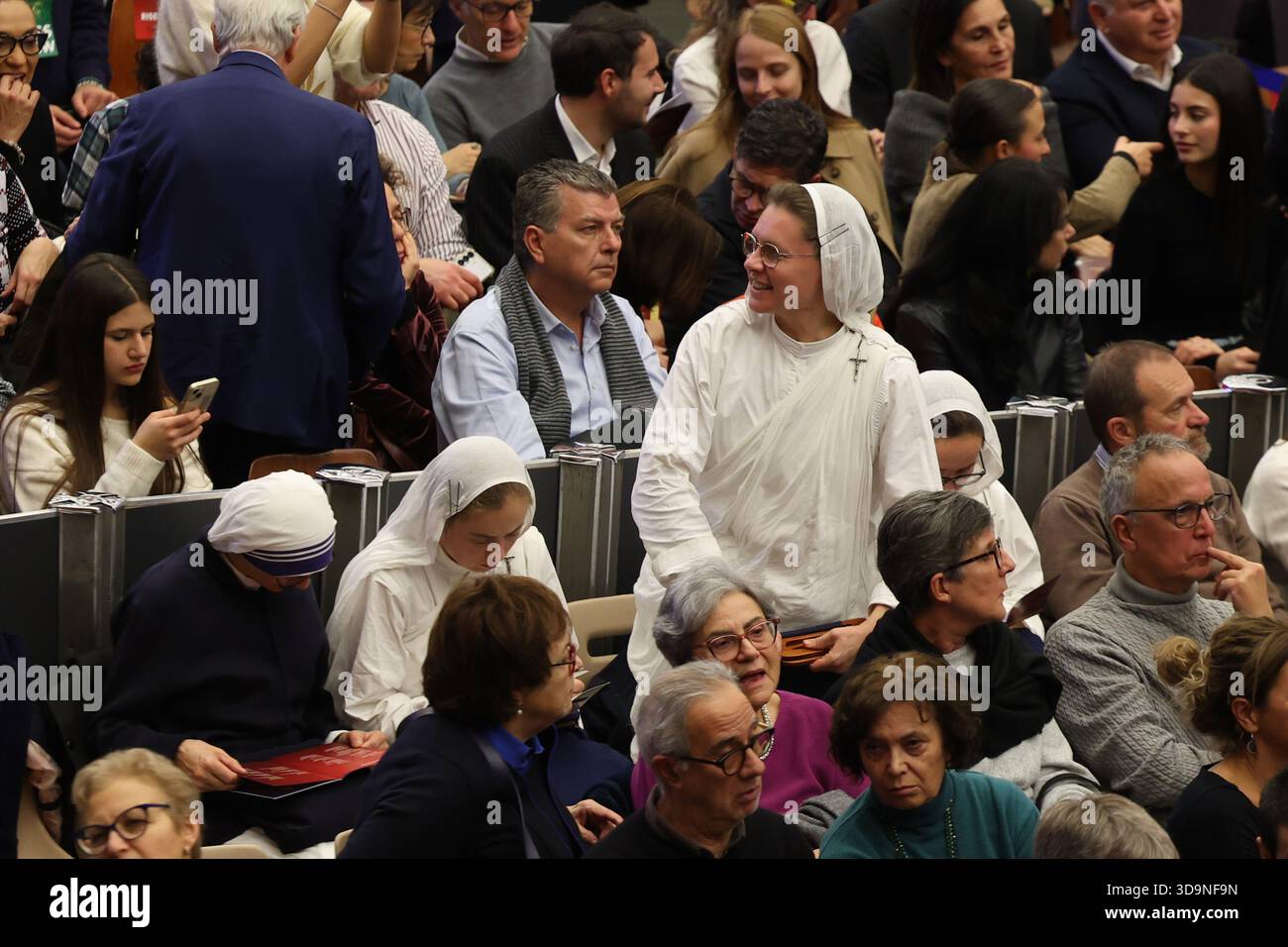 Vatican City, Italy - December 6, 2025: Nuns await the concert. Pope ...