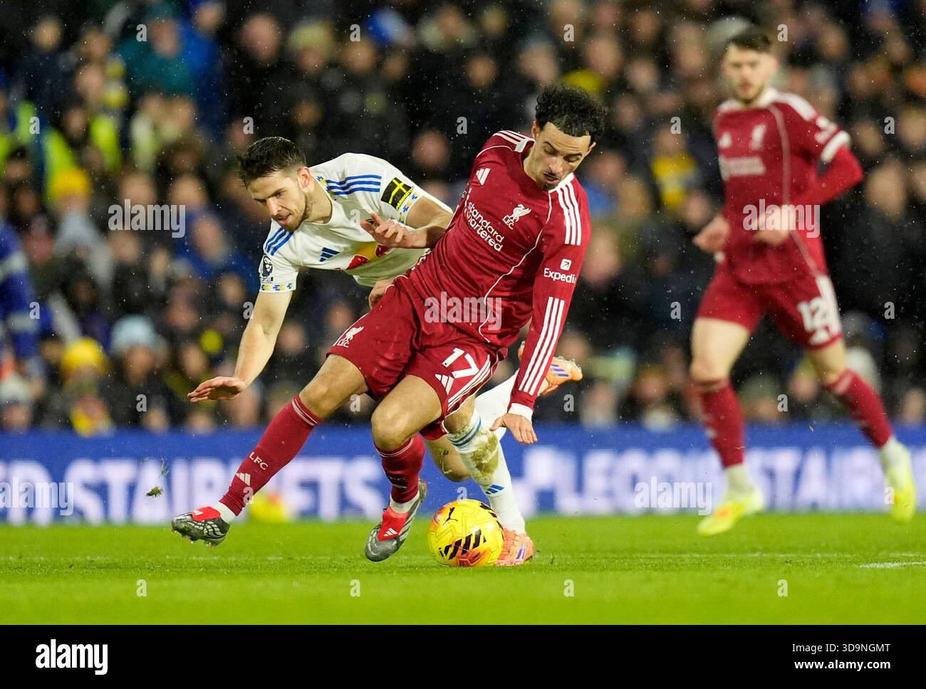 Leeds United's Anton Stach (left) and Liverpool's Curtis Jones battle ...