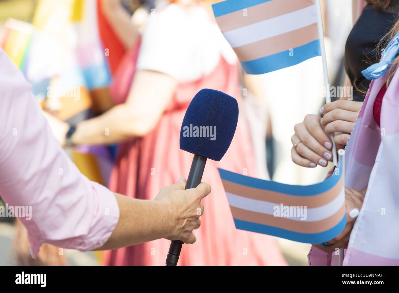 Transgender flag microphone hi-res stock photography and images - Alamy