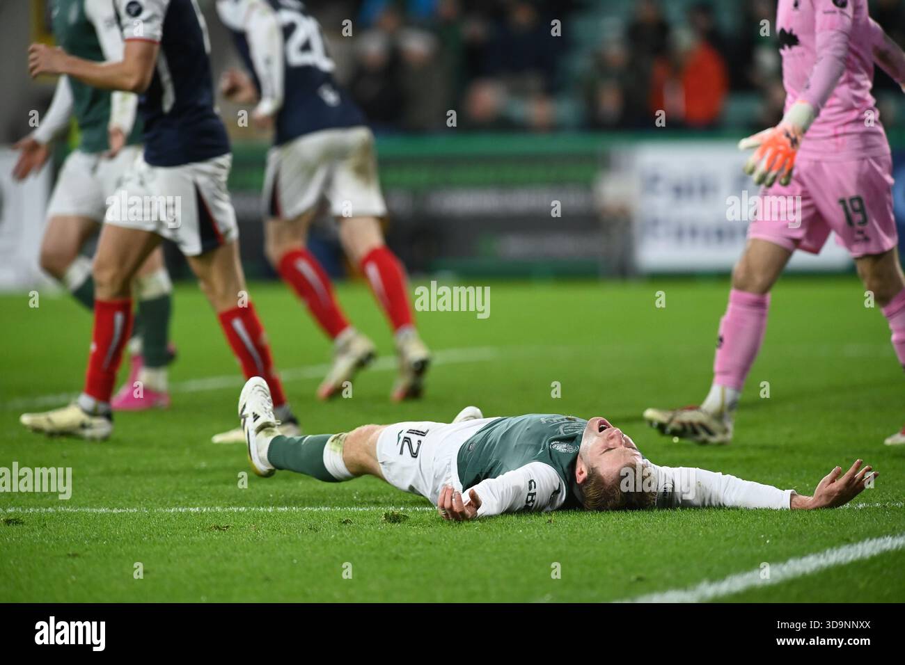 Chris cadden of hibs penalty claim turned down hi-res stock photography ...