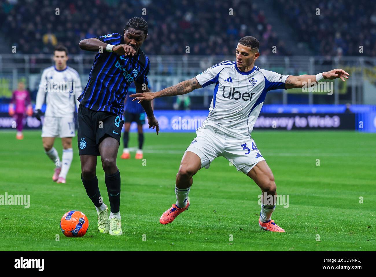 Marcus Thuram of FC Internazionale competes for the ball with Diego ...
