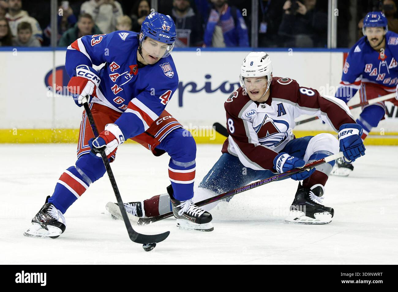 New York Rangers left wing Conor Sheary (43) controls the puck past Colorado Avalanche ...