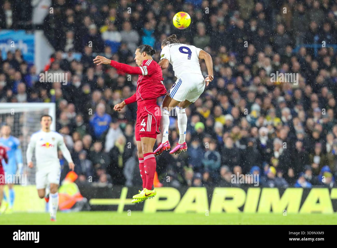 Dominic Calvert-Lewin Of Leeds United heads the ball ahead of Virgil ...