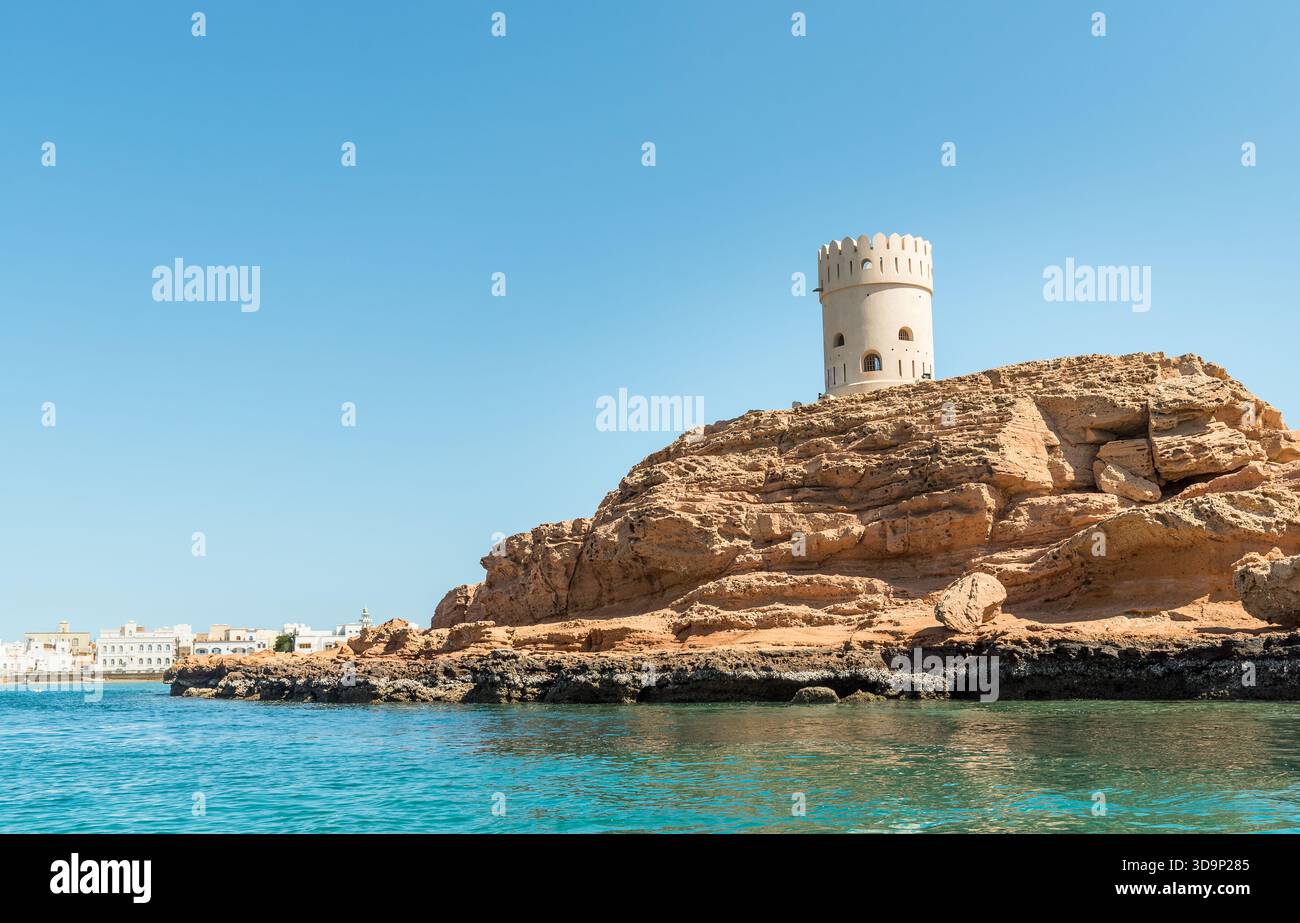 Historic Sur Watch Tower on a rocky promontory overlooking the Arabian ...