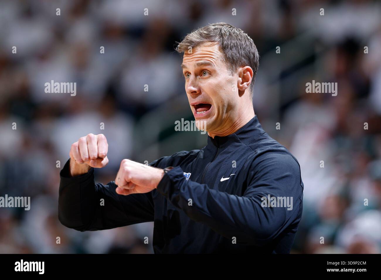 Duke coach Jon Scheyer gestures during the first half of an NCAA ...