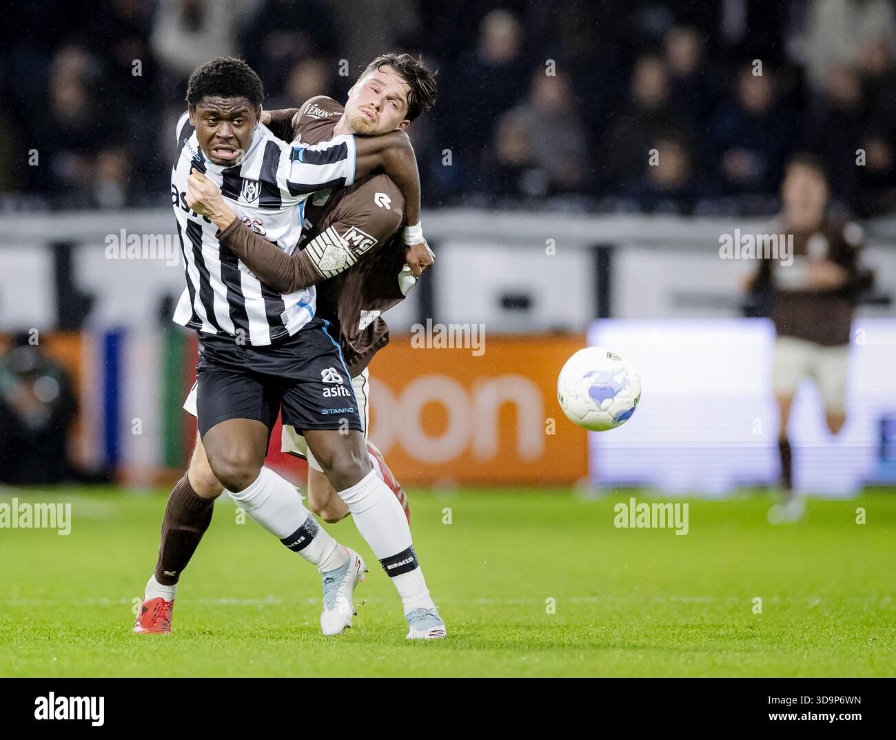 ALMELO - (L-R) Bryan Limbombe of Heracles Almelo and Danny Bakker of ...