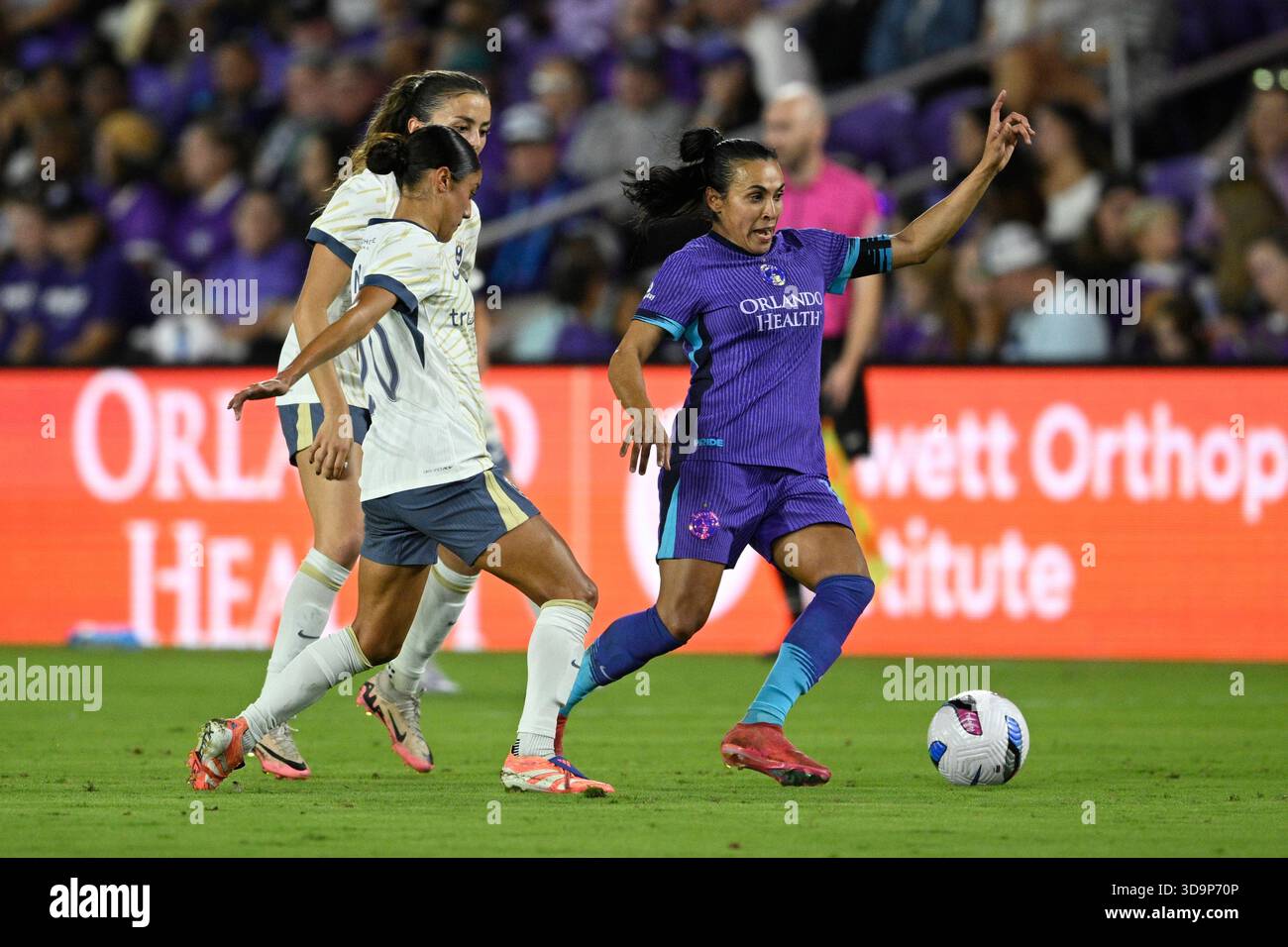 Orlando Pride forward Marta, right, competes for the ball with Seattle ...