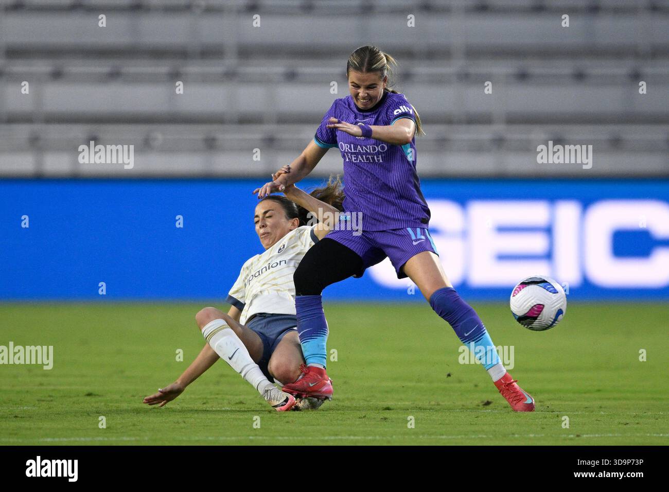 Seattle Reign FC defender Madison Curry, left, and Orlando Pride ...