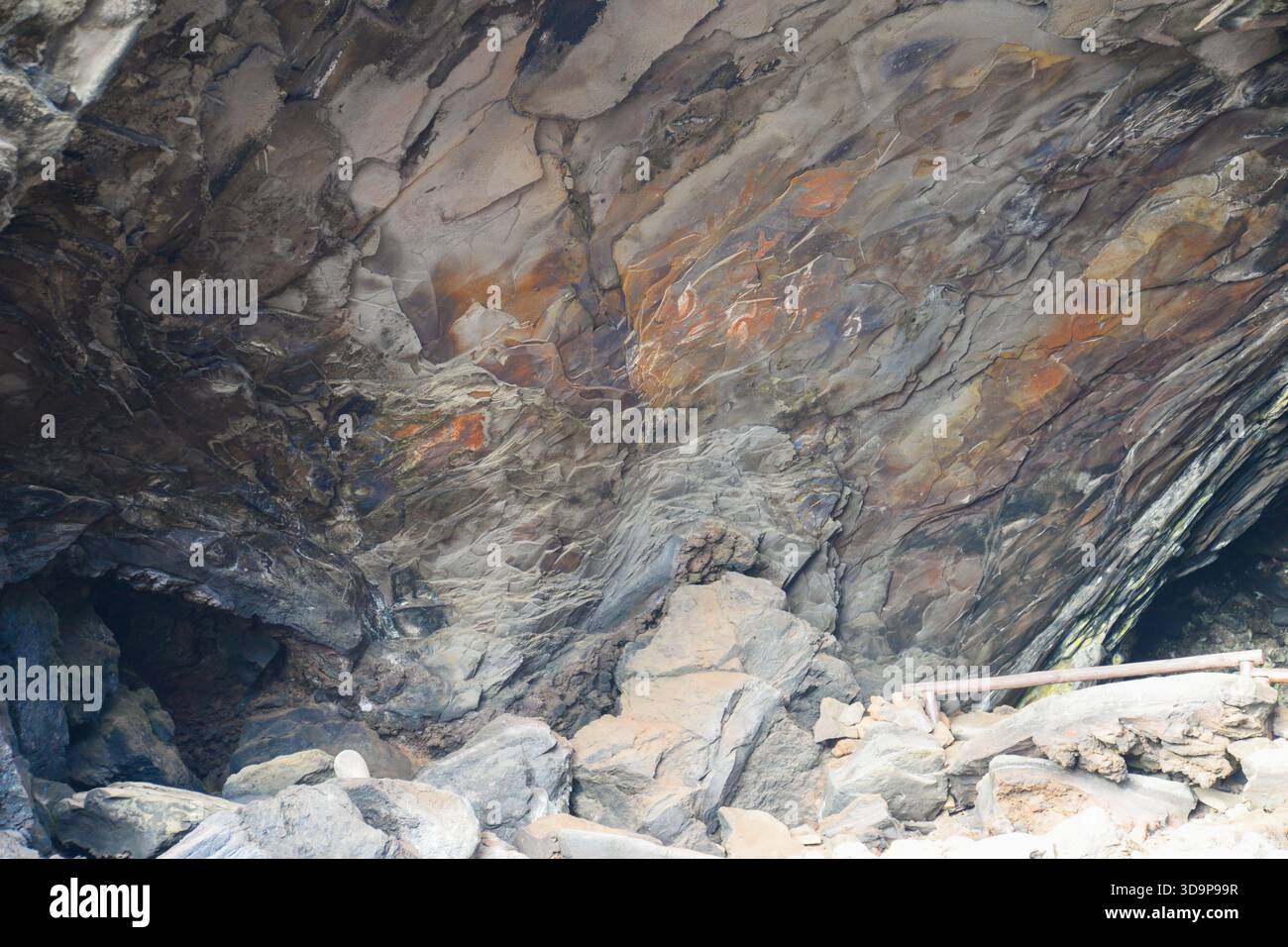 Ancient cave with colorful rocks and traces of prehistoric art Stock ...