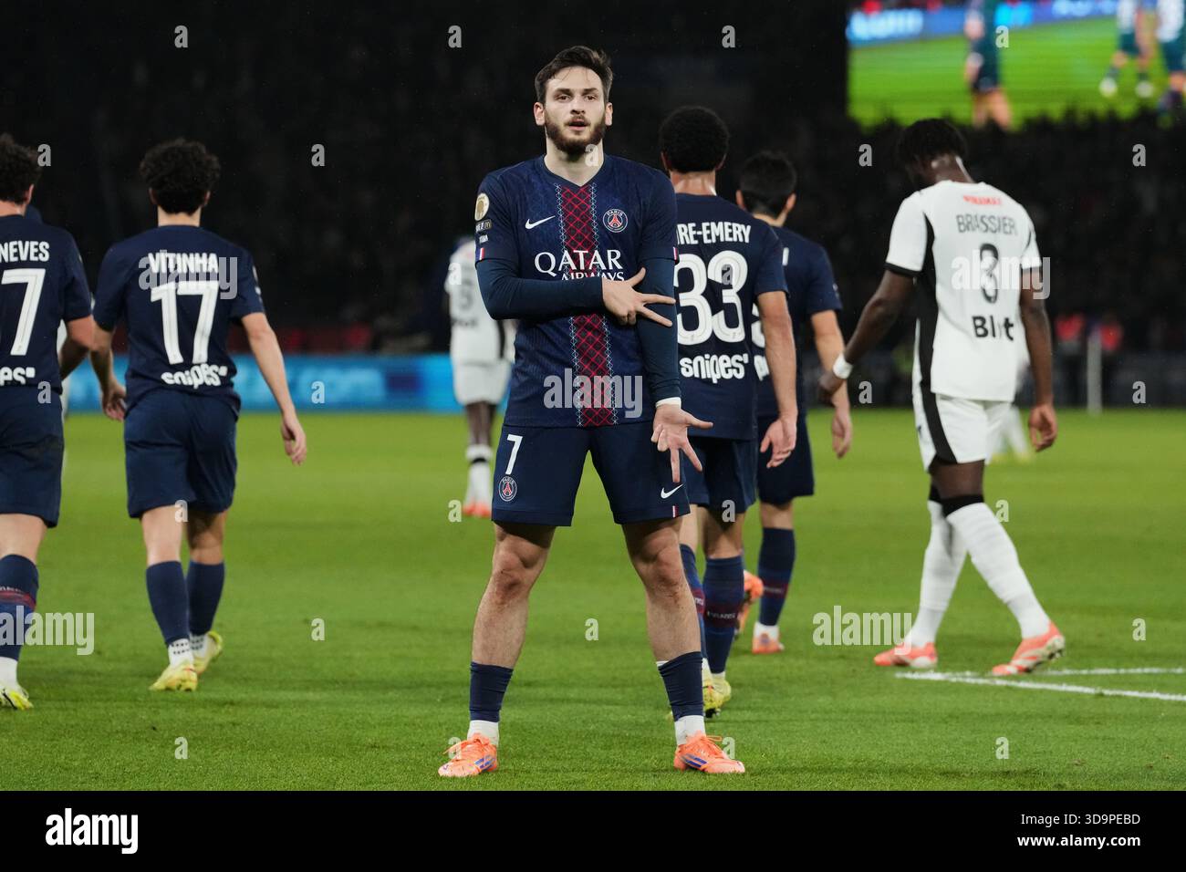 PSG's Khvicha Kvaratskhelia celebrates after scoring his side's first ...
