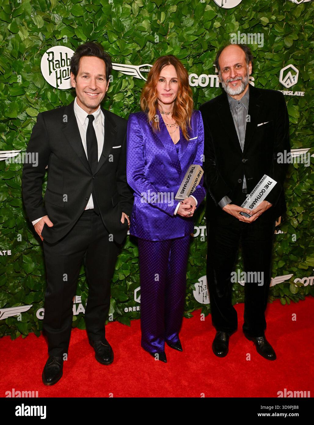 Paul Rudd, left, Julia Roberts and Luca Guadagnino pose with the film ...