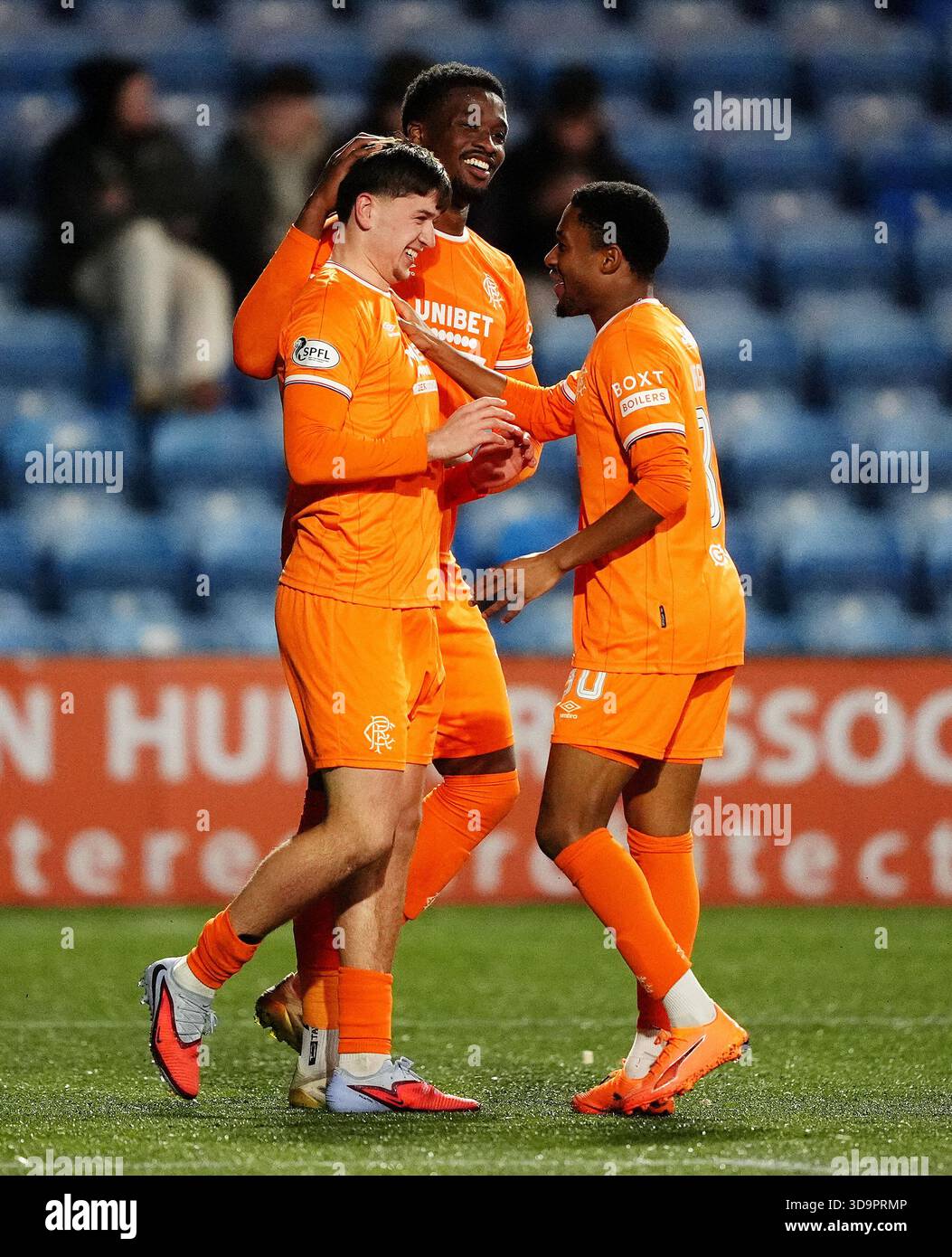 Rangers' Mikey Moore (left) celebrates with team-mates after scoring ...