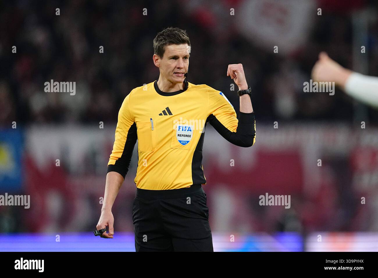 December 06 2025: Daniel Siebert gestures during a 1.Bundesliga game ...