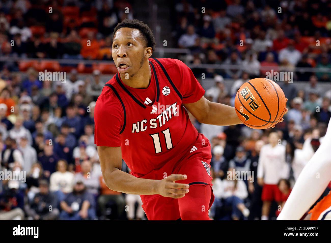 NC State guard Quadir Copeland dribbles the ball during the first half ...