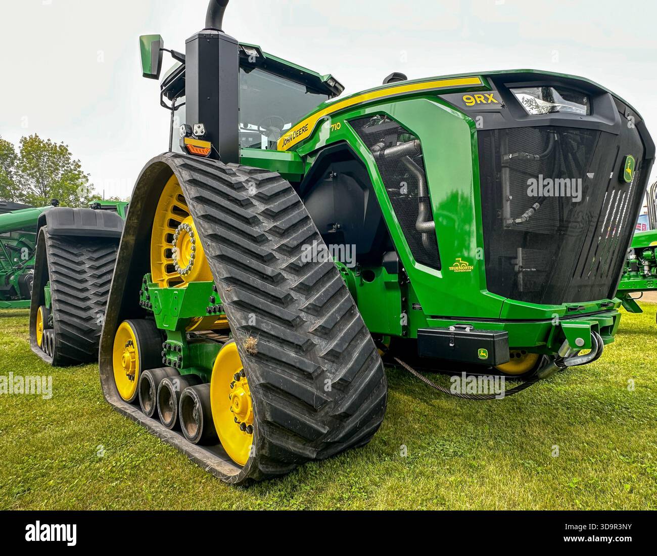 ROSEAU, MN - 23 JUL 2025: Close up of a new John Deere 9RX 710 tractor ...