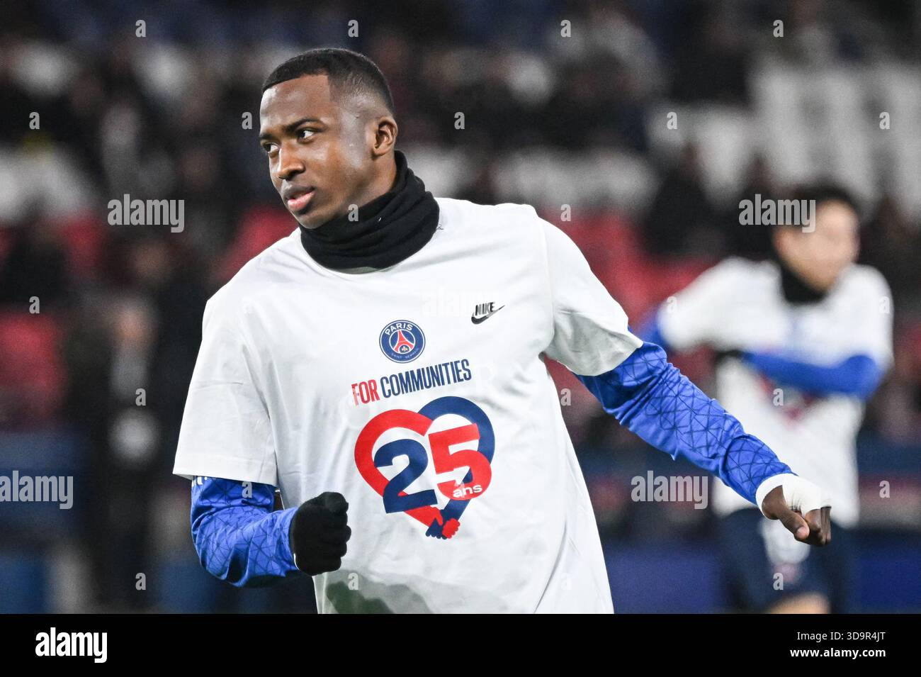 Paris Saint-Germain’s defender William Pacho warms up before the French ...