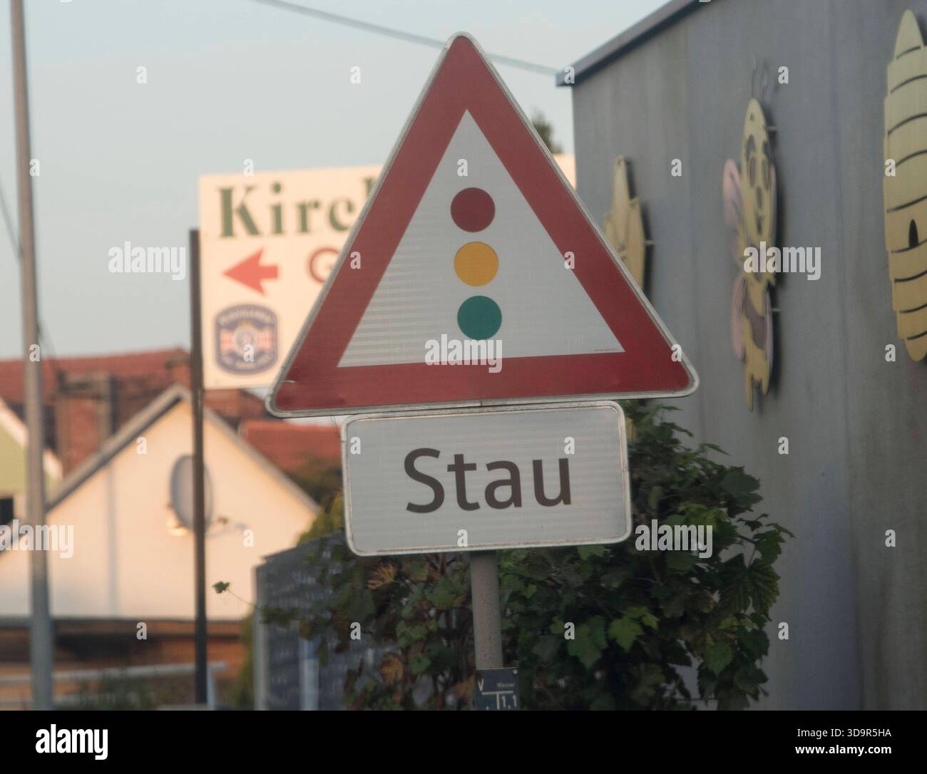a traffic congestion warning road sign standing on the street traffic ...