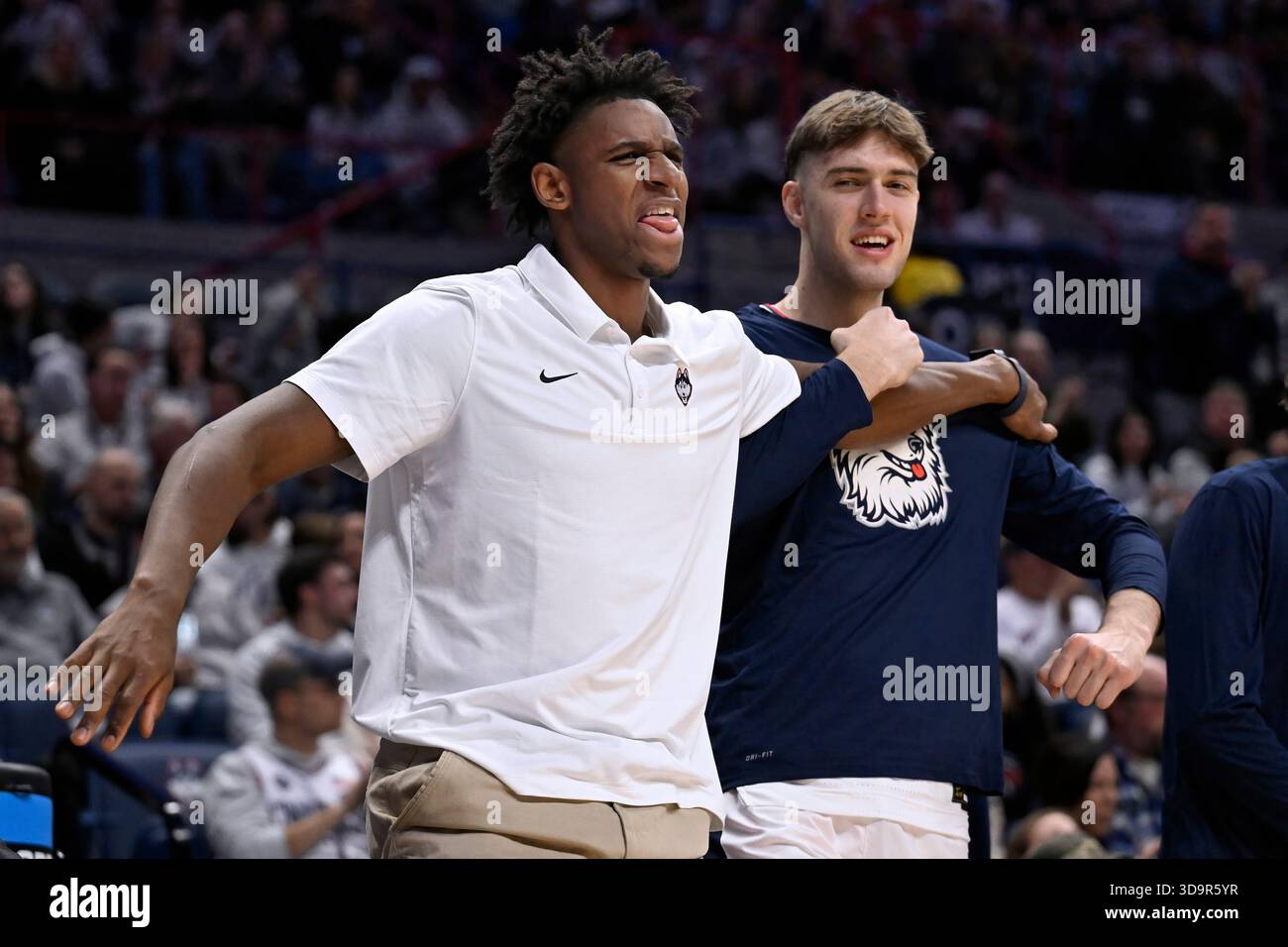 UConn forward Tarris Reed Jr., left, and UConn center Rrezon Elezaj ...