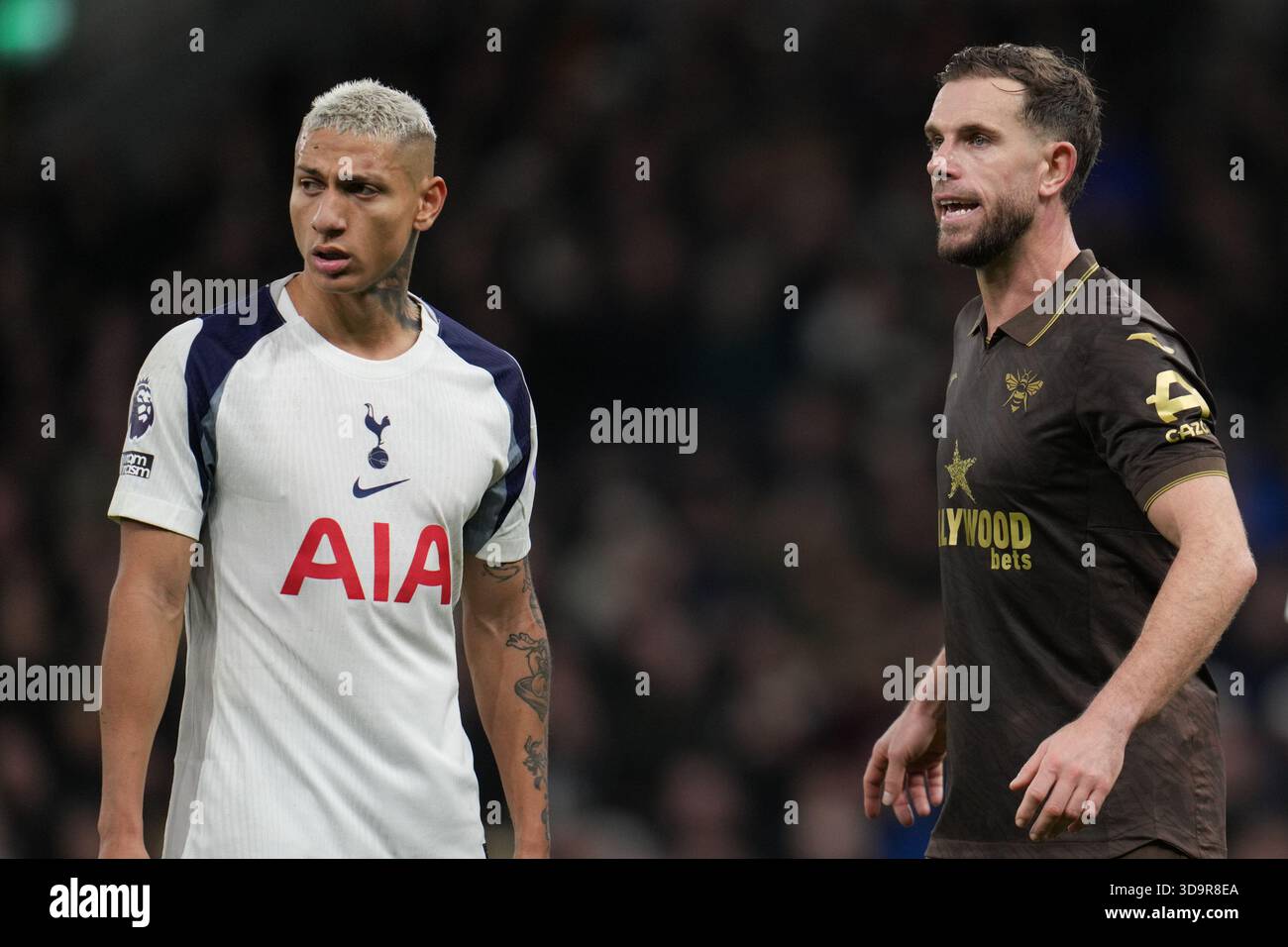 Richarlison of Tottenham Hotspur and Jordan Henderson of Brentford ...