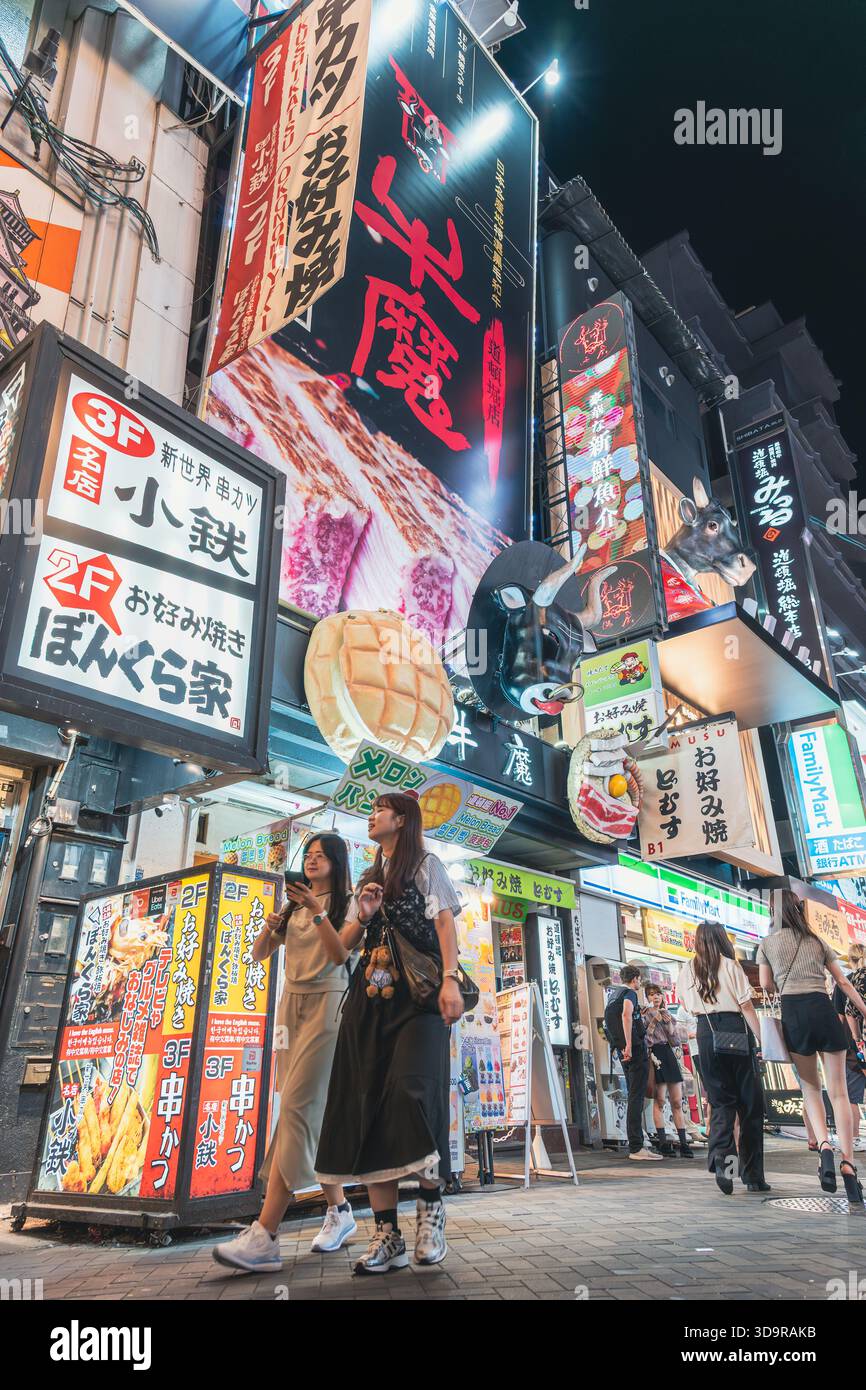 Osaka's Dotonbori district glows with the intense, colourful light of ...